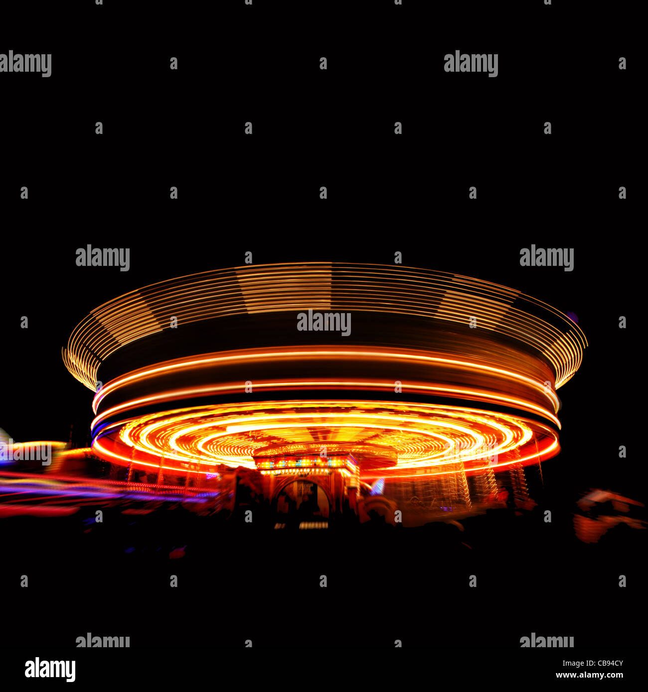 carousel in motion at night Stock Photo - Alamy