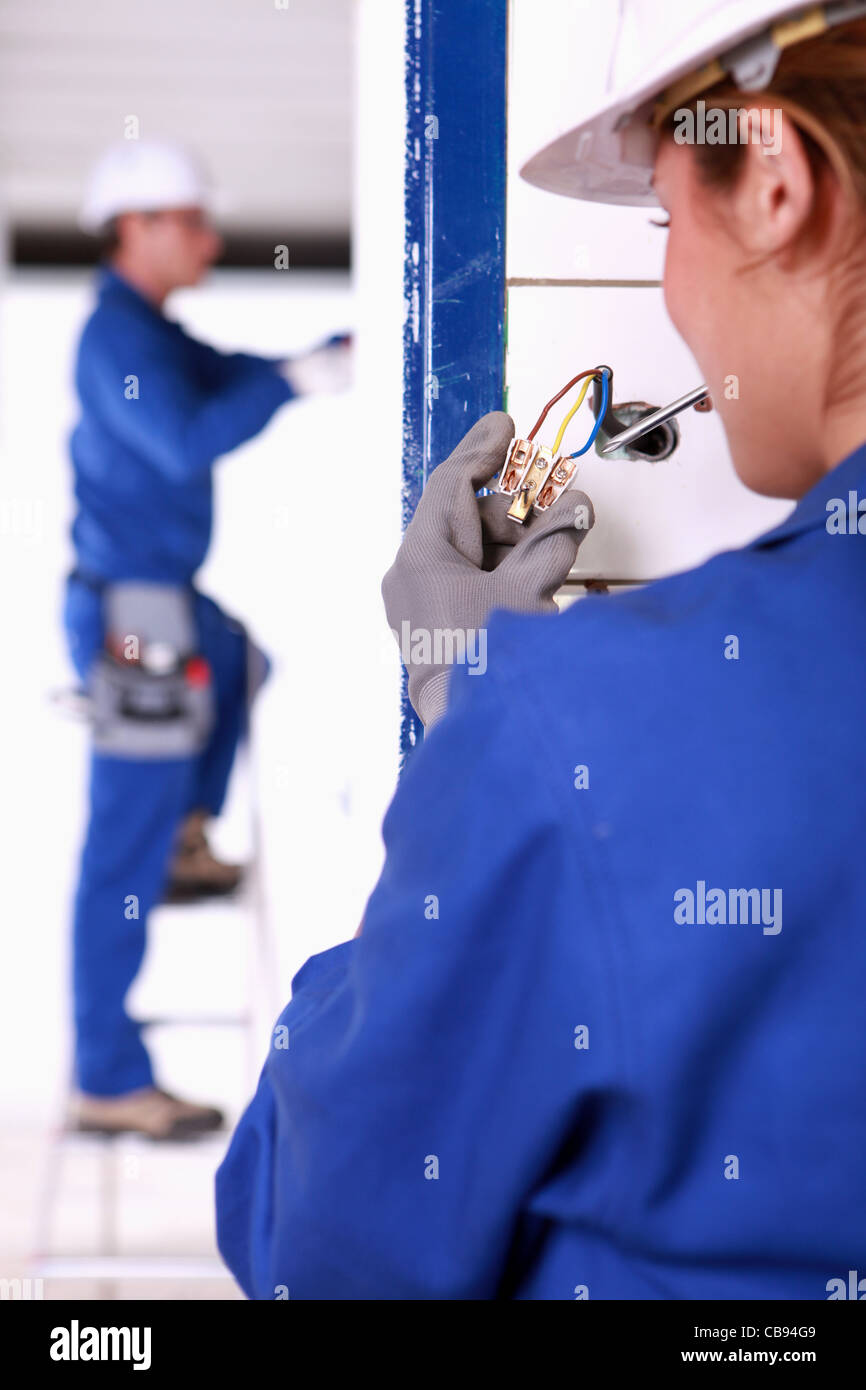 Electricians solving problems on electrical network Stock Photo - Alamy