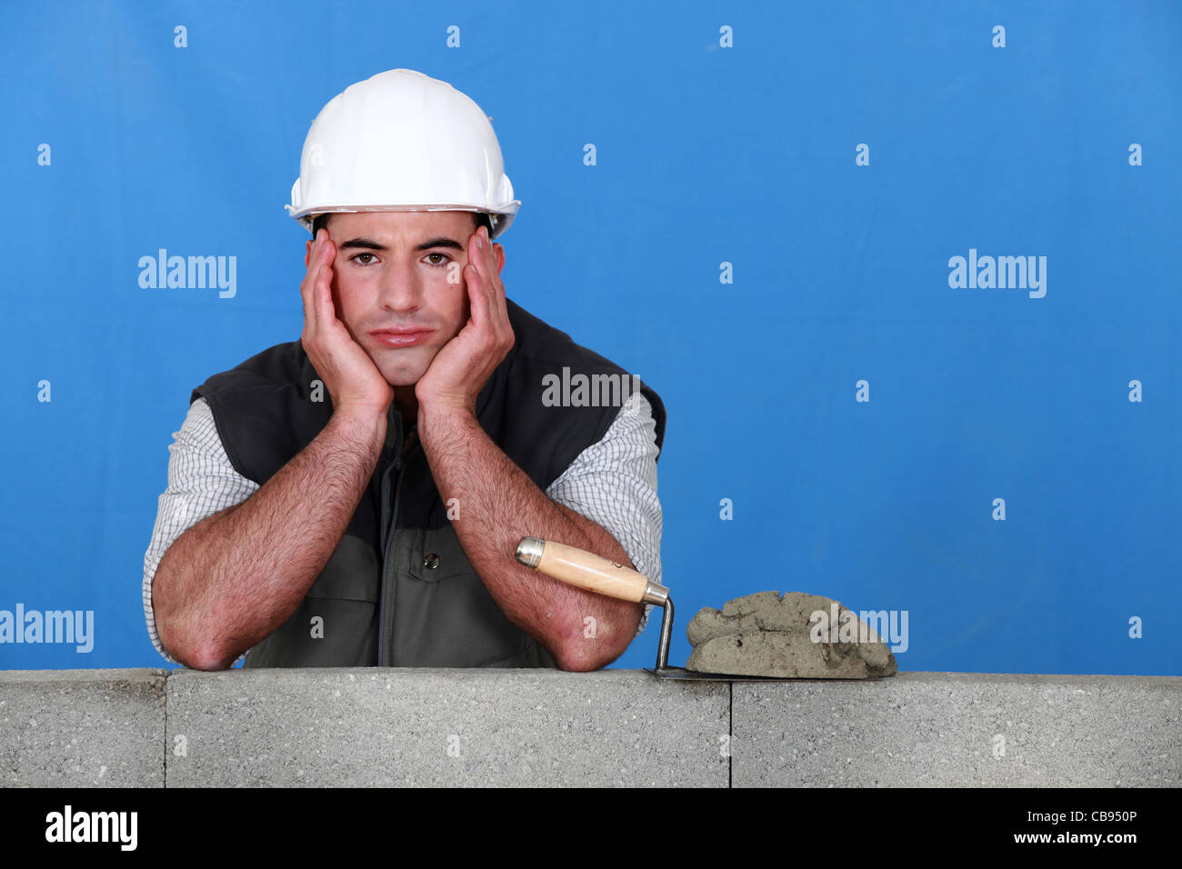 A frustrated bricklayer Stock Photo - Alamy