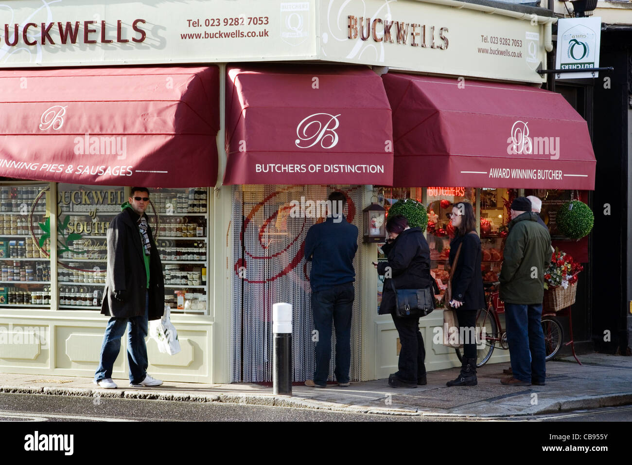 customers queue outside of traditional game butchers to place orders ...