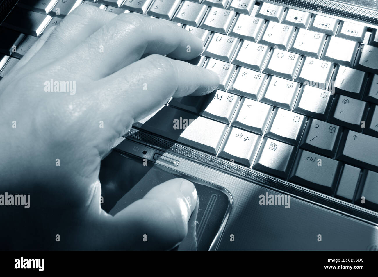 Working on computer Stock Photo - Alamy