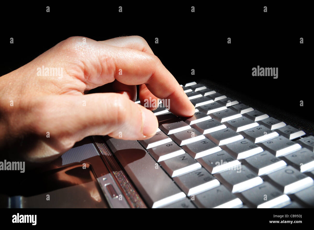 Working on computer Stock Photo - Alamy