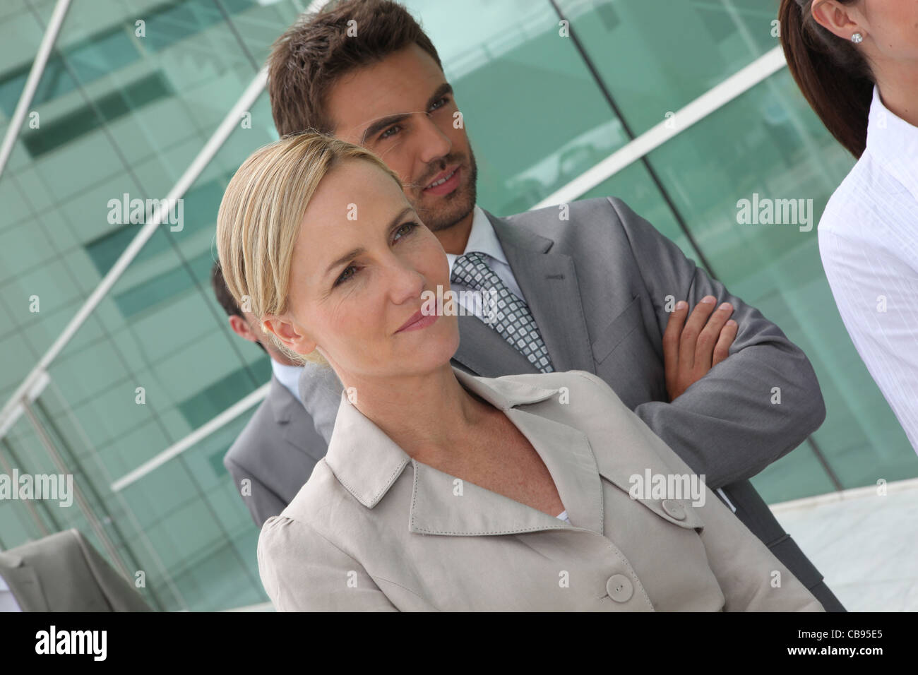 Executives outside office building Stock Photo - Alamy