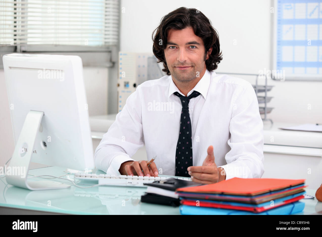 Man at the office Stock Photo - Alamy