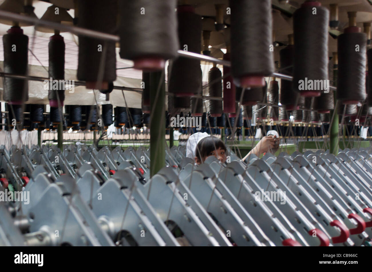 Young textile mill worker hi-res stock photography and images - Alamy