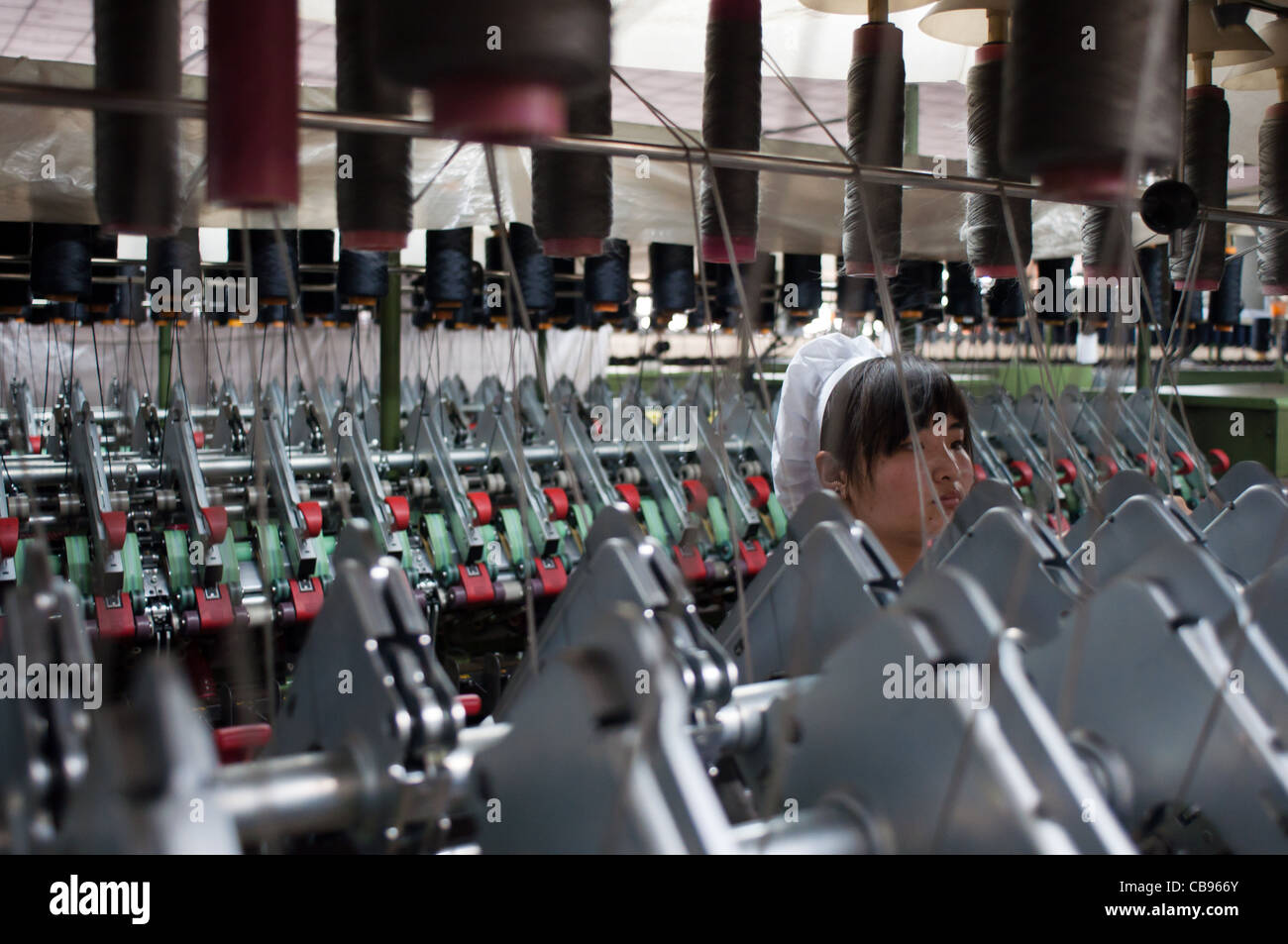 Young textile mill worker hi-res stock photography and images - Alamy