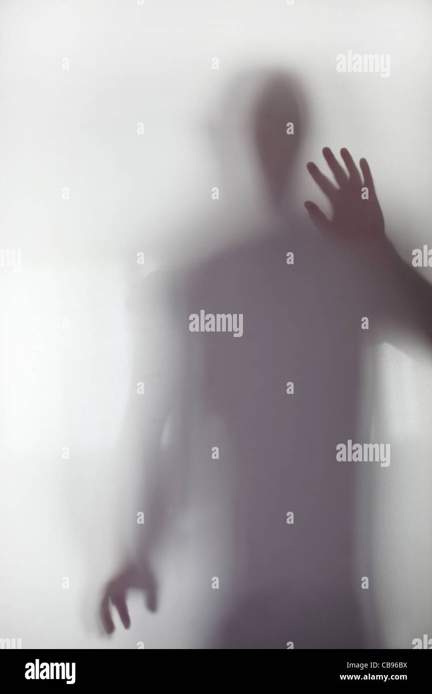 Person stood behind frosted glass Stock Photo - Alamy