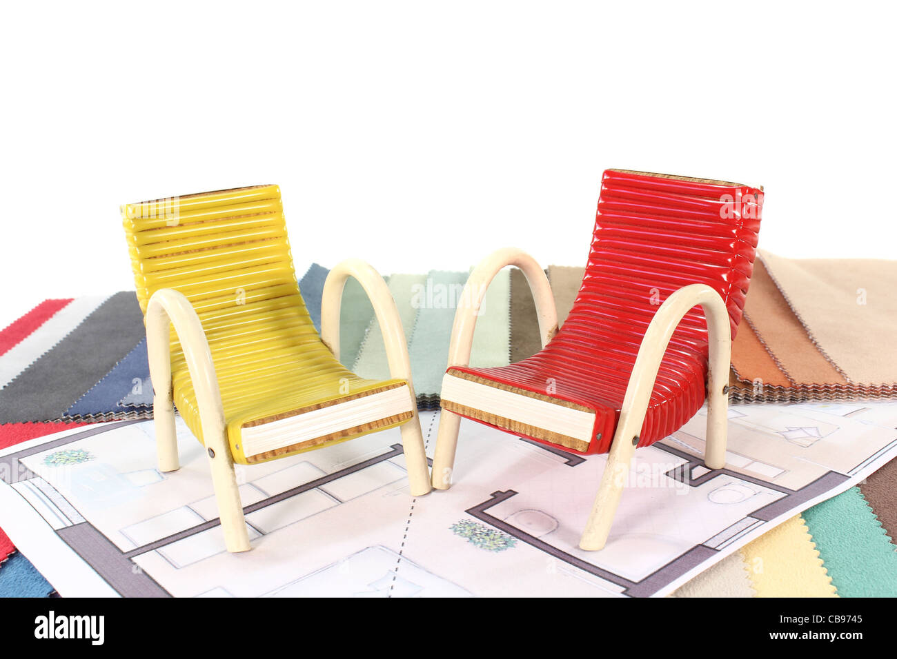 colorful fabric samples with a ground plan of a residential and chair ...