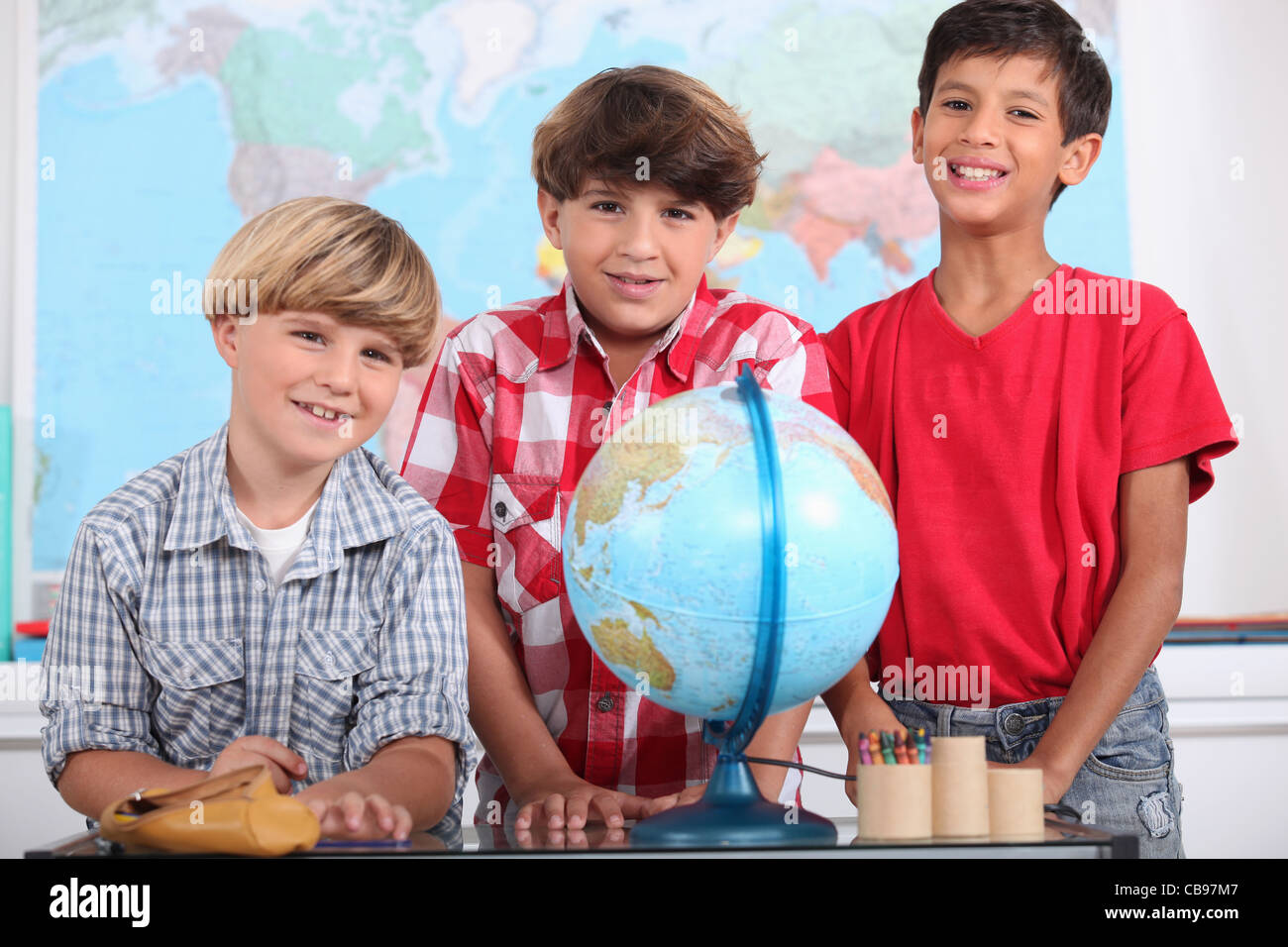 three boys at school Stock Photo - Alamy