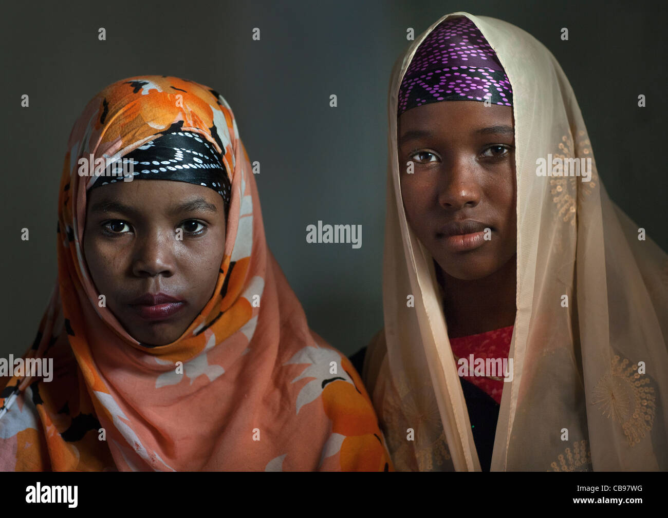 two veiled teenage girls looking at camera Stock Photo - Alamy
