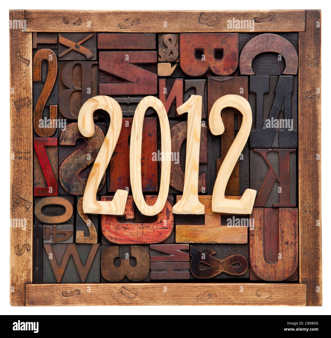 year 2012 in unfinished wood letters over a box of antique letterpress ...