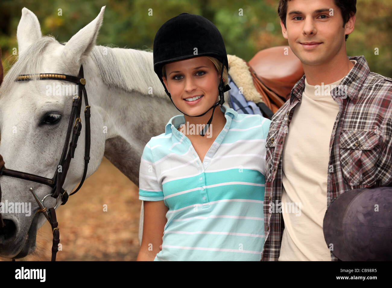 Young horseback riders Stock Photo - Alamy