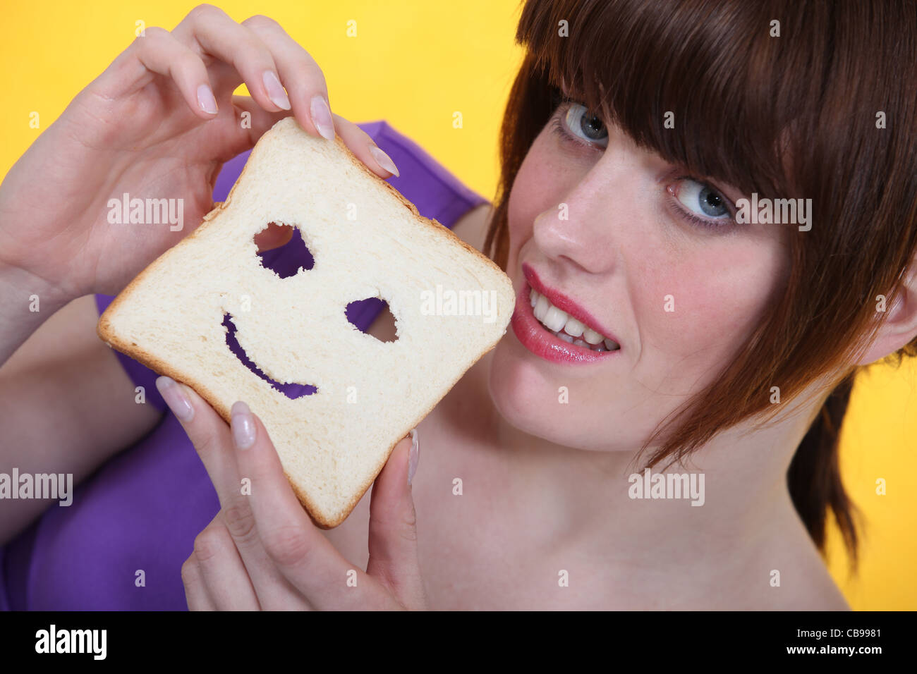 Smiling slice of bread Stock Photo - Alamy