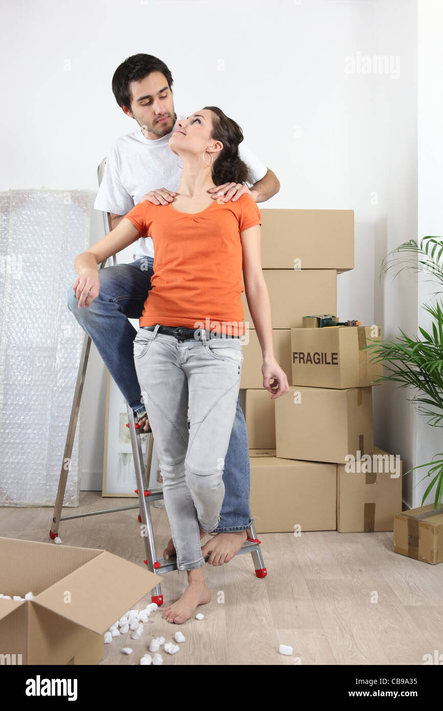 Couple happy to have finally moved into new flat Stock Photo - Alamy