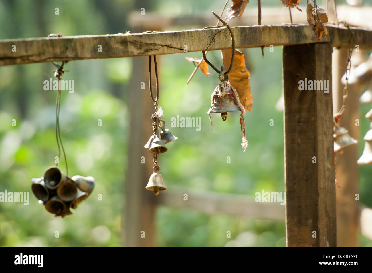 Bells hanging in the woods Stock Photo - Alamy