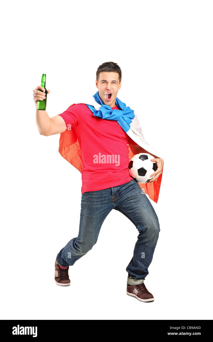 Football fan covered with dutch flag and holding a beer bottle and ...