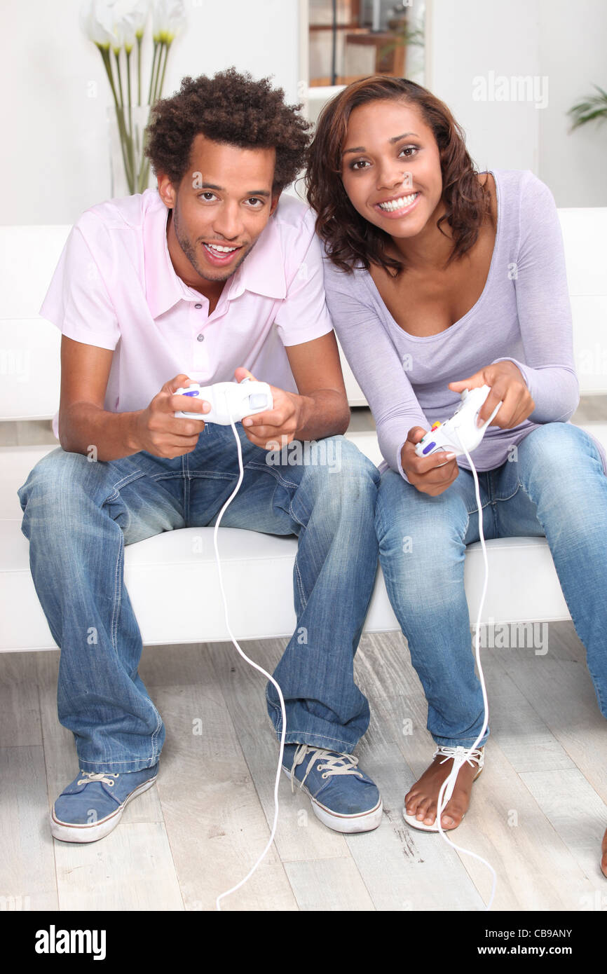 Couple playing computer games Stock Photo - Alamy