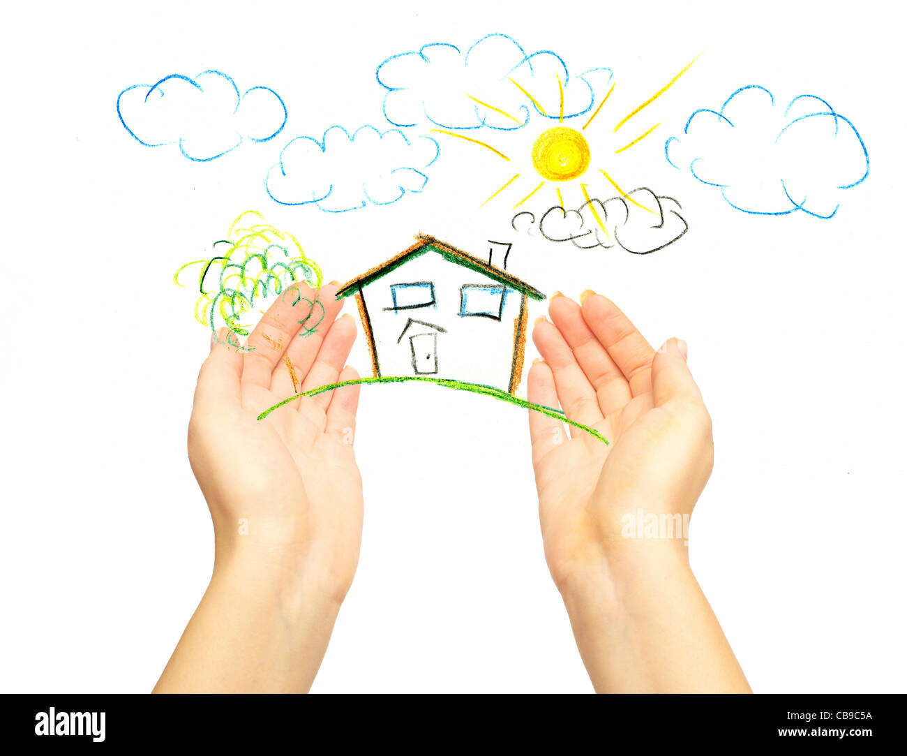 The drawing house in human hands. Isolated on white Stock Photo - Alamy