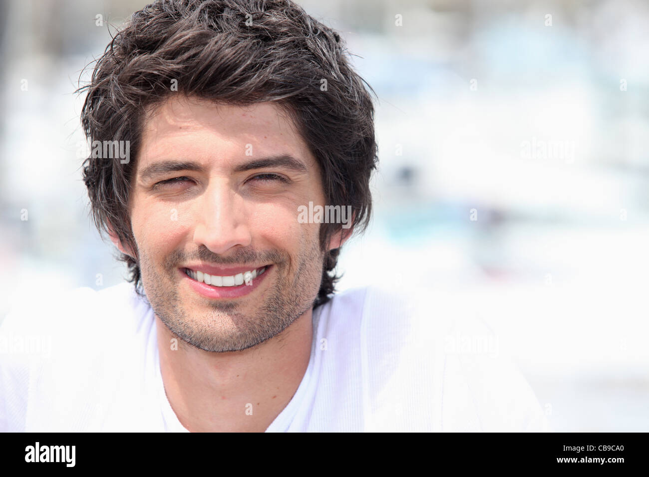 Handsome smiling man Stock Photo - Alamy