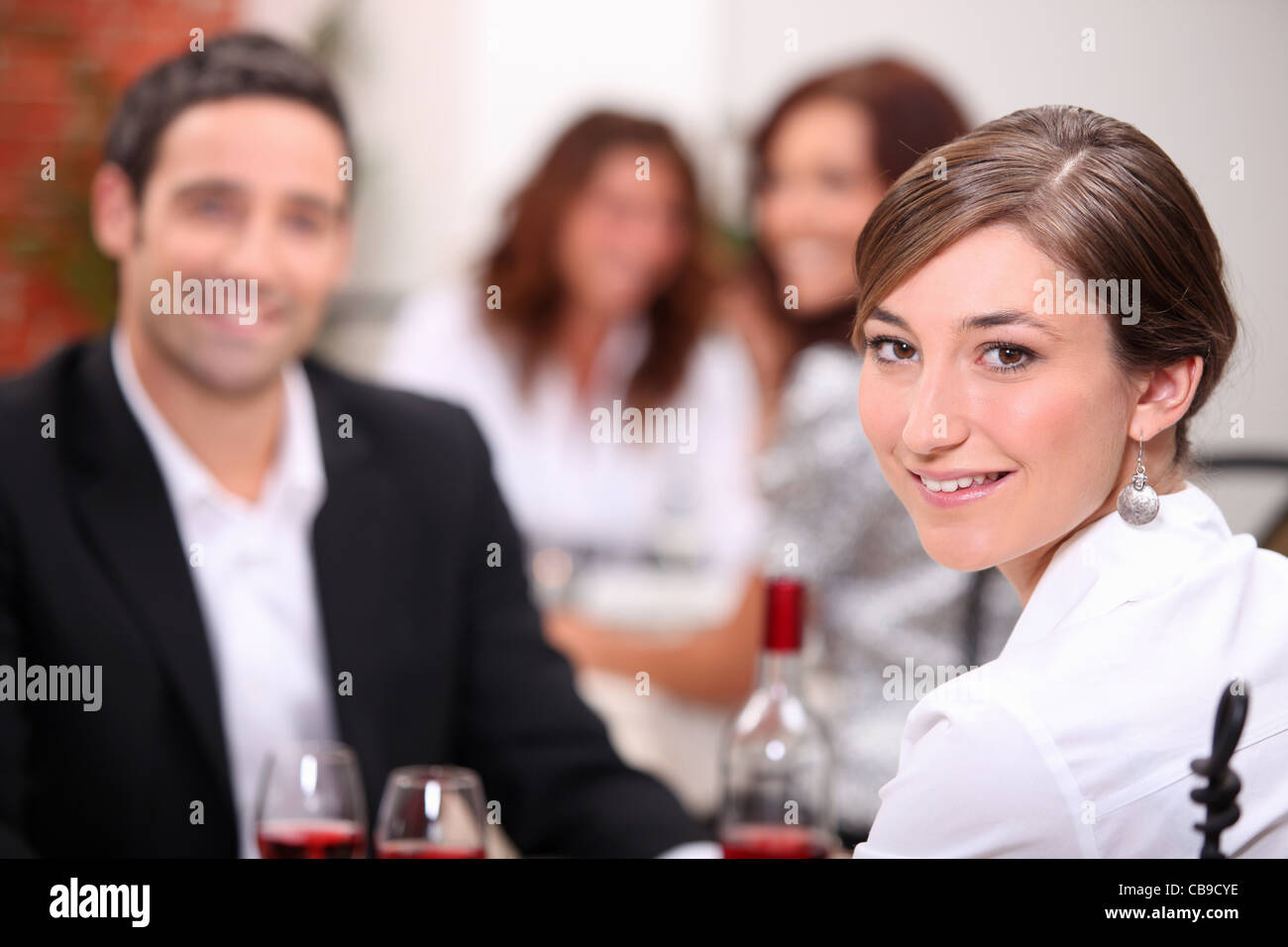 Woman dining with her partner in a restaurant Stock Photo - Alamy