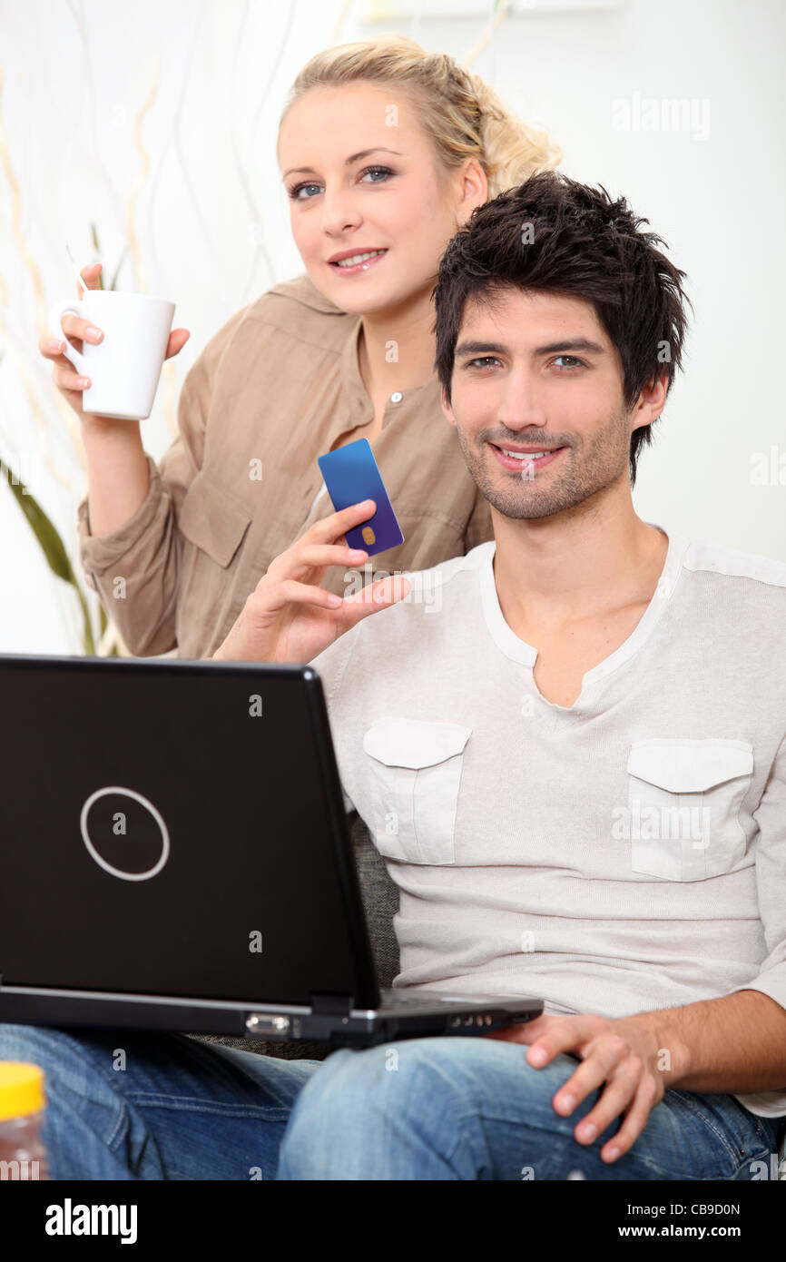 Couple doing online shopping Stock Photo - Alamy