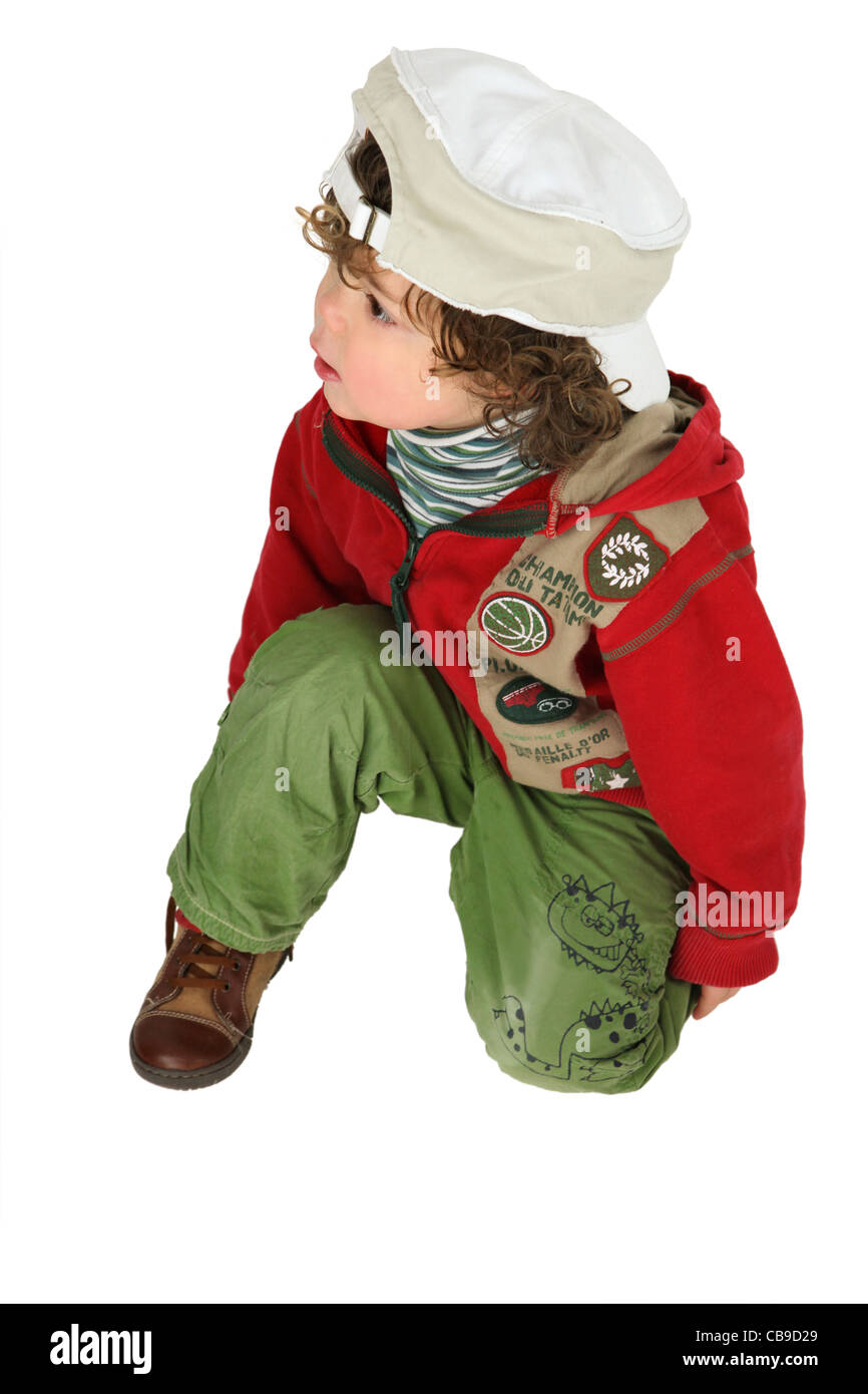 Little boy with curly hair and a cap Stock Photo - Alamy