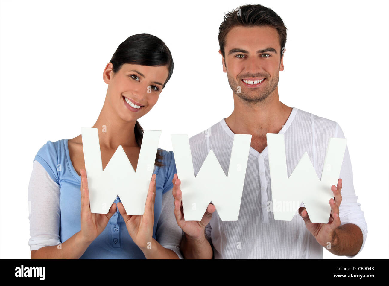 Man and woman holding letters Stock Photo - Alamy