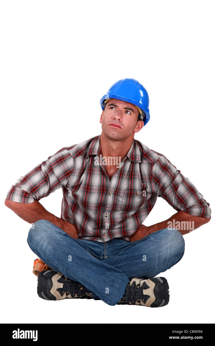 Sad face young man sitting Cut Out Stock Images & Pictures - Alamy