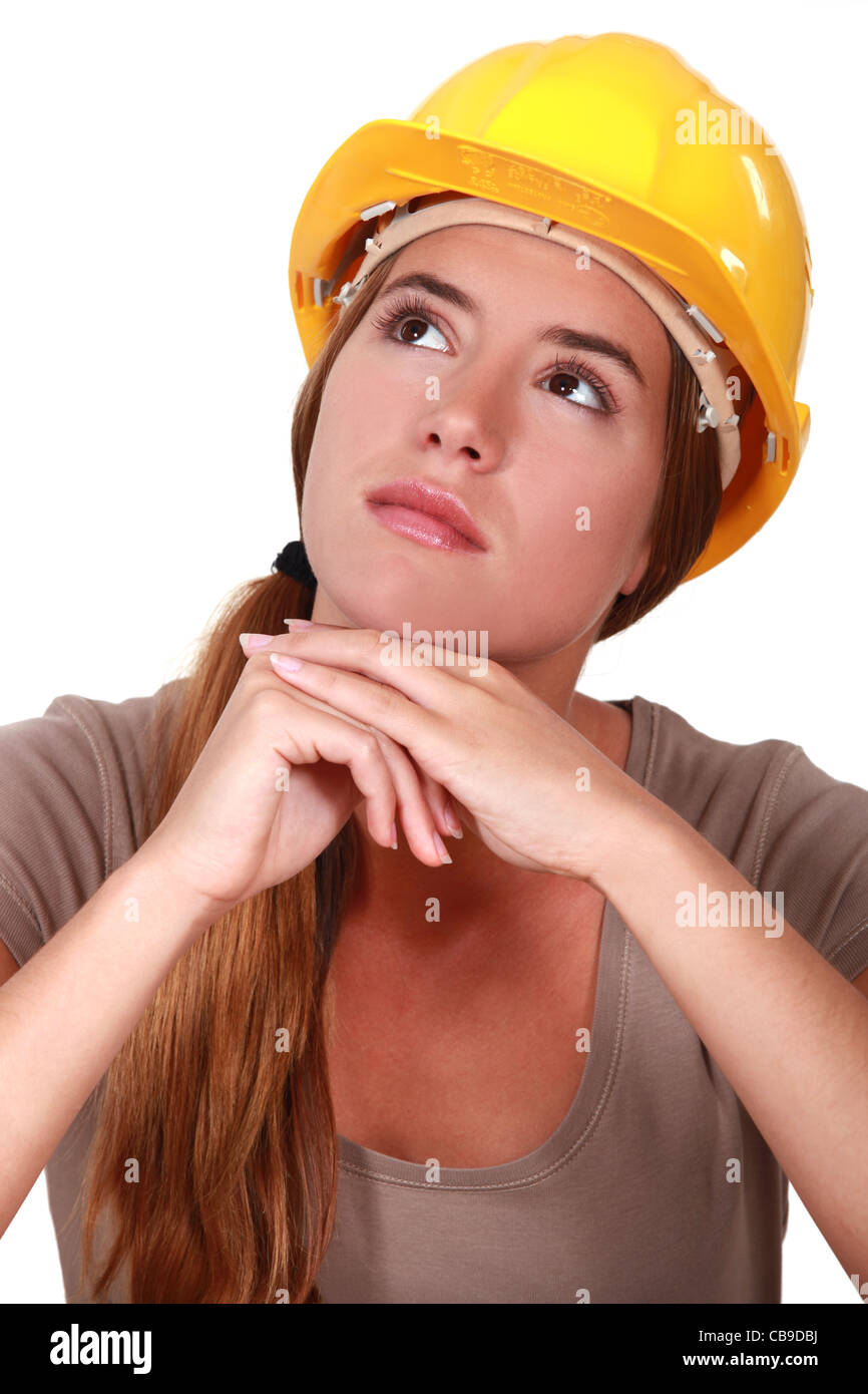A pensive female construction worker Stock Photo - Alamy