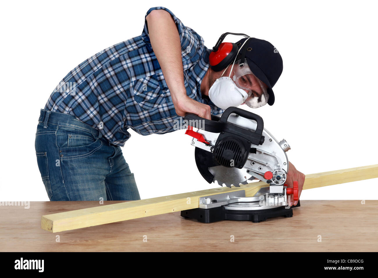Carpenter using circular saw Stock Photo - Alamy