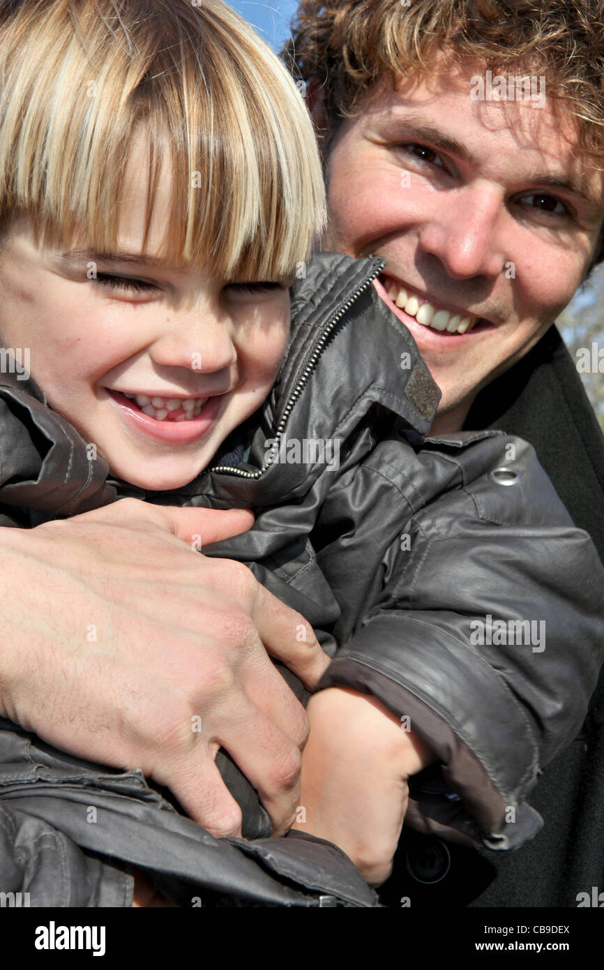 Father and son bonding outdoors Stock Photo - Alamy