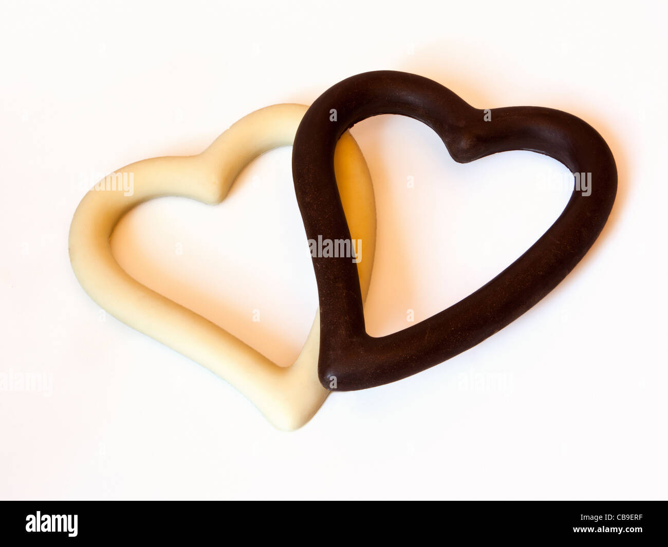 two overlapped chocolate hearts, different kinds of chocolate Stock ...