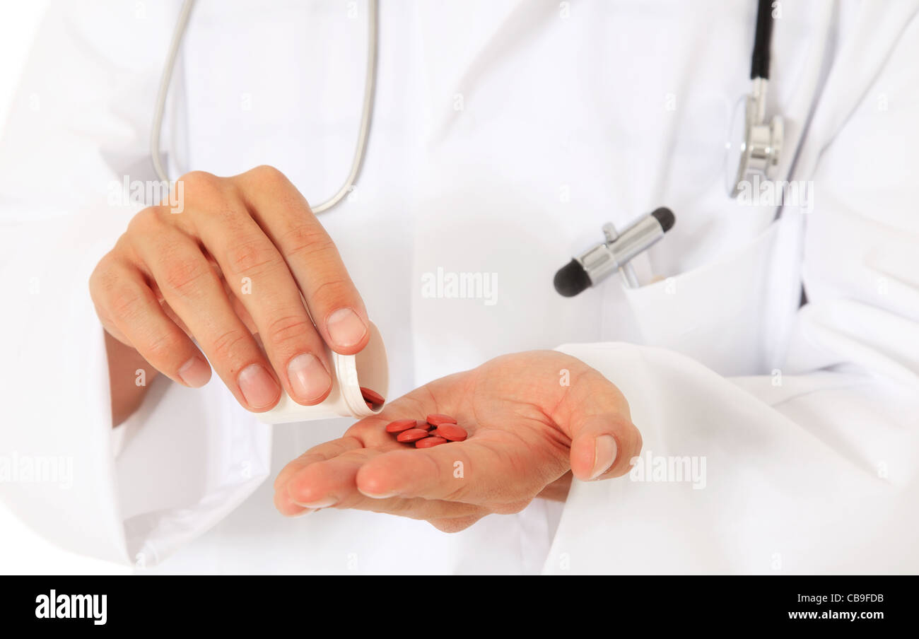 Doctor holding pharmaceuticals Stock Photo - Alamy