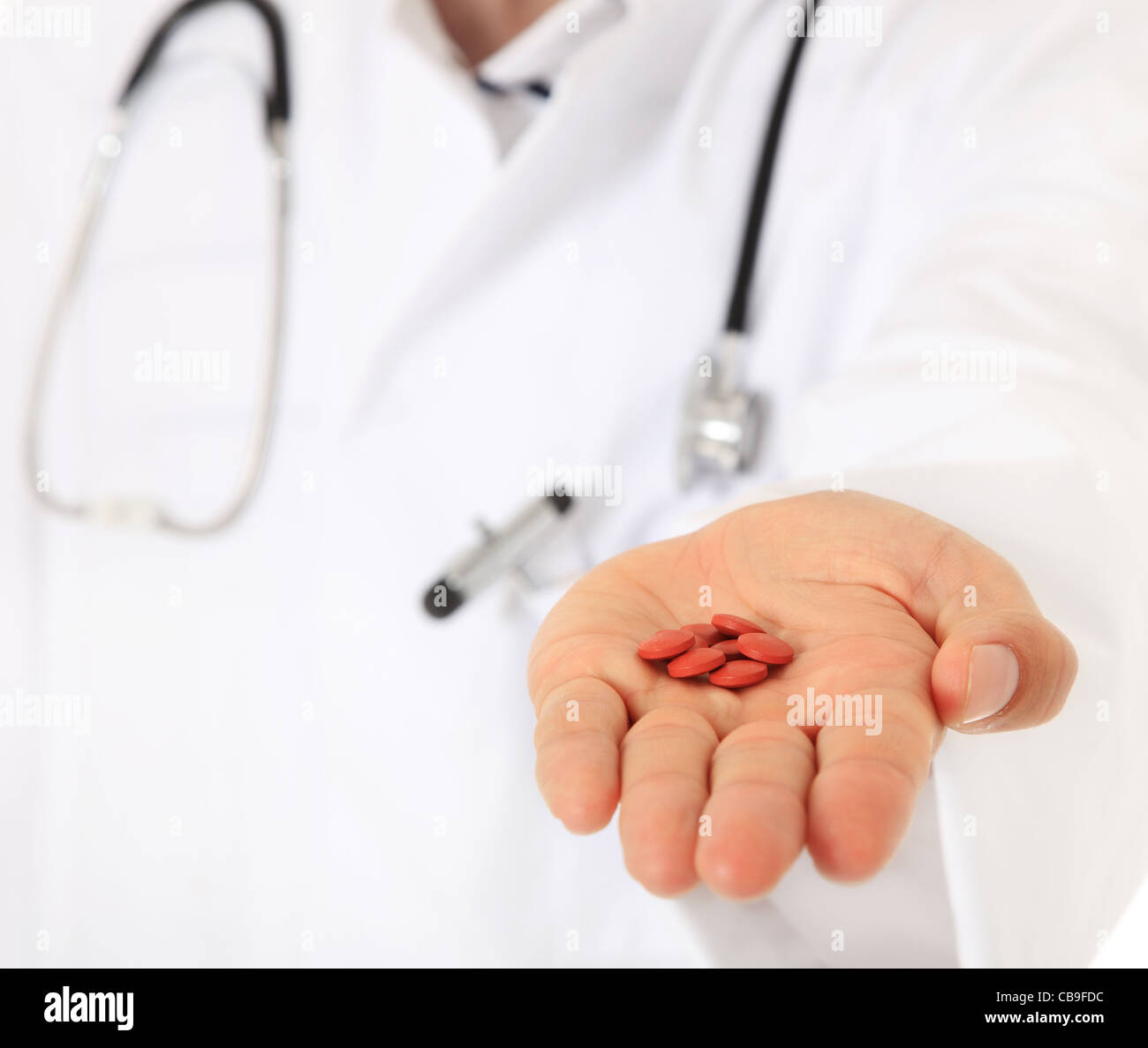 Doctor holding pharmaceuticals Stock Photo - Alamy