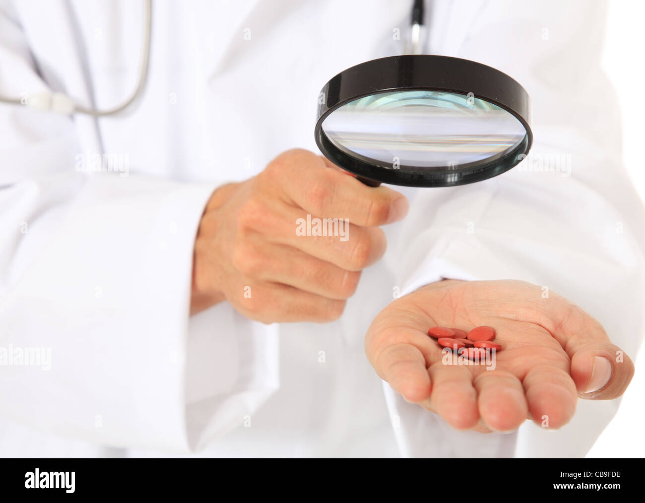 Doctor checking pharmaceuticals. All on white background Stock Photo ...