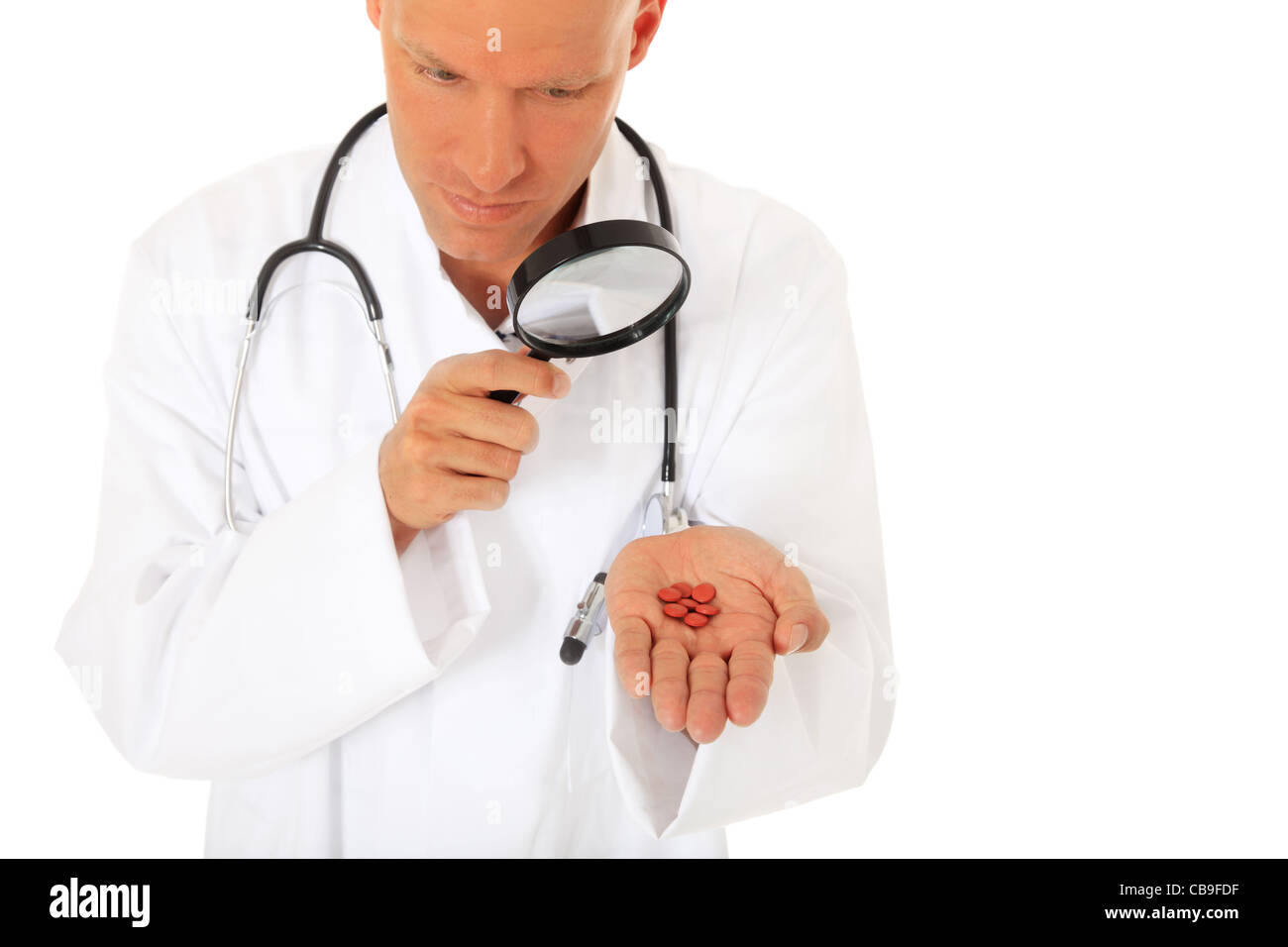 Doctor checking pharmaceuticals. All on white background Stock Photo ...