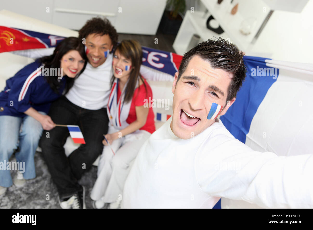Red fans screaming football hi-res stock photography and images - Alamy