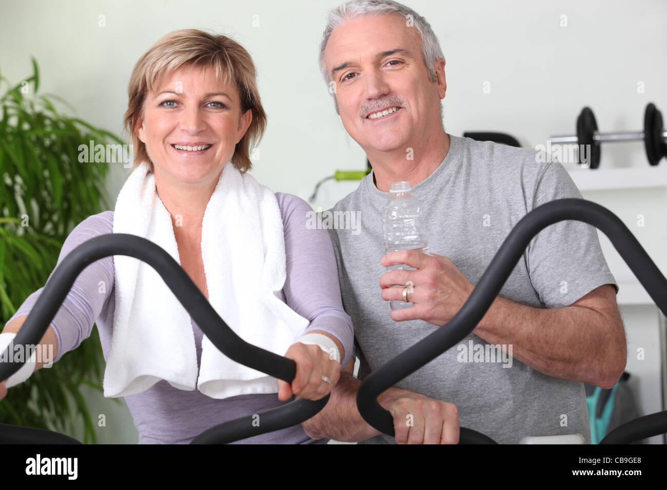 Couple working out together Stock Photo - Alamy