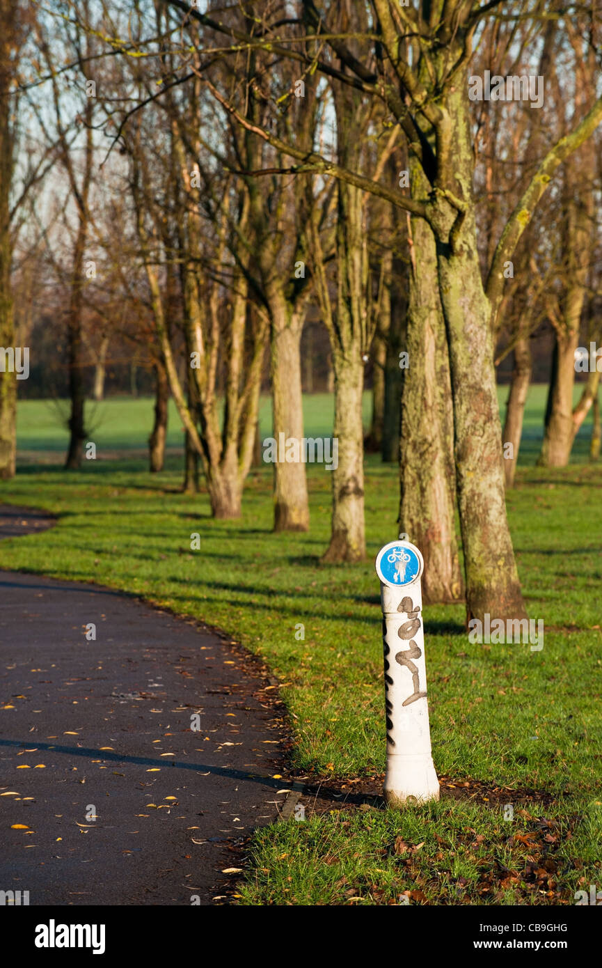 A cycling and walking sign on a path in Gloucester Park in Basildon ...