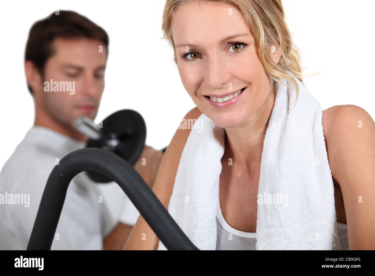 Man and woman working out in gym Stock Photo - Alamy