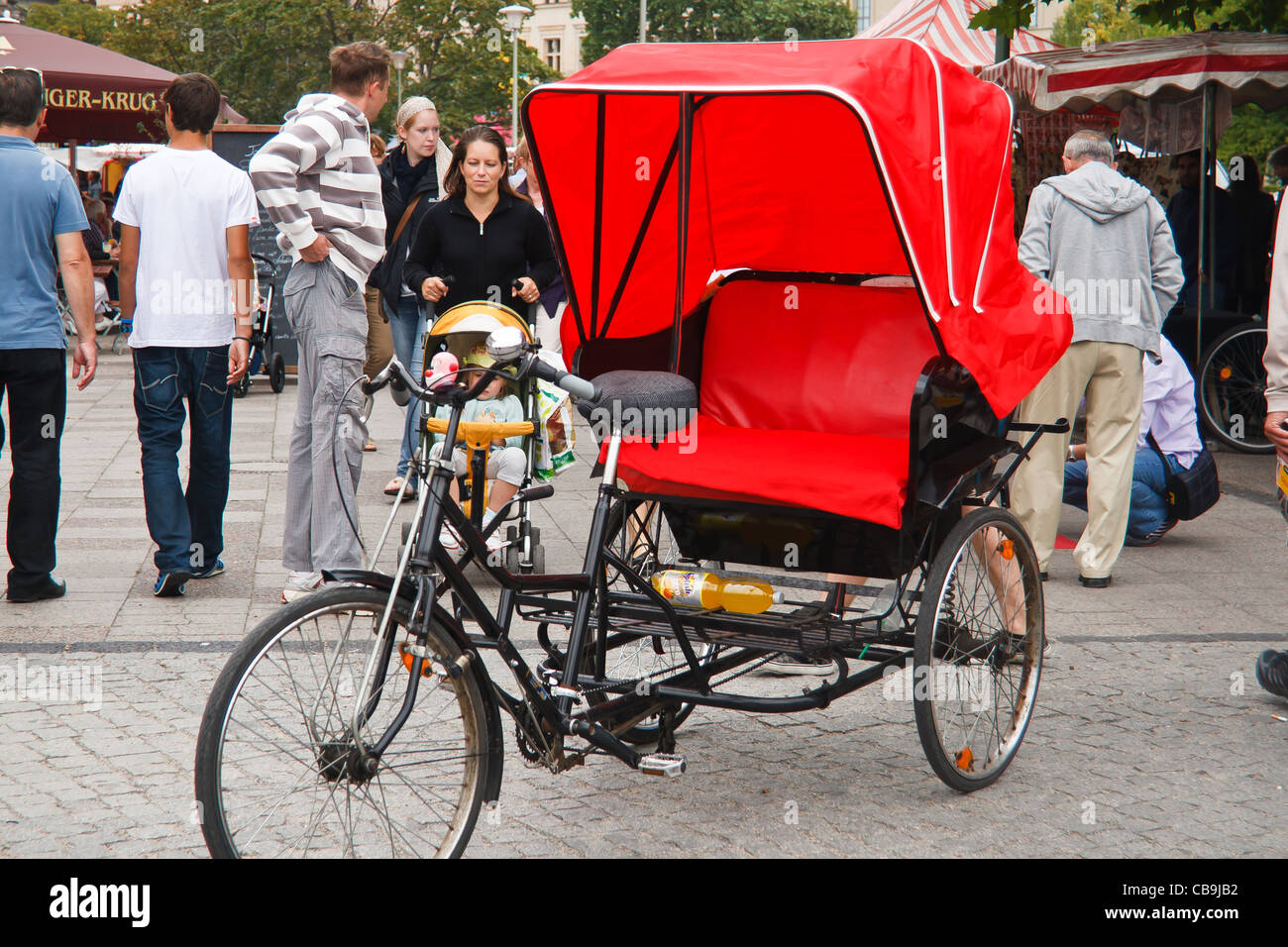 Empty bike rickshaw in Berlin, Germany Stock Photo - Alamy