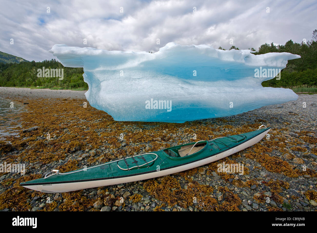 Kayak and blue iceberg. Glacier Bay National Park. Alaska. USA Stock ...