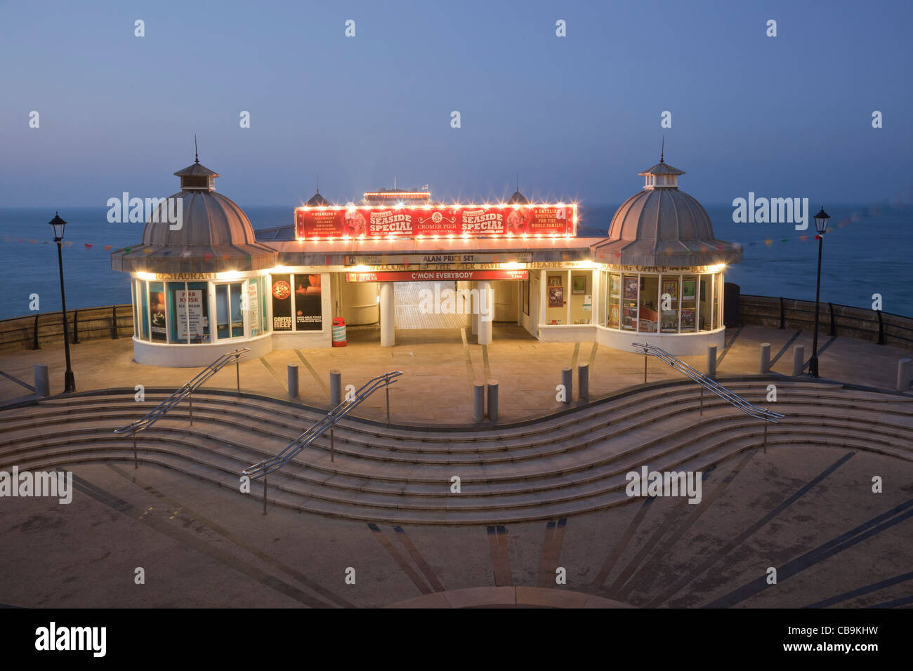 Entrance to Cromer pier, illuminated, at sunset Stock Photo - Alamy