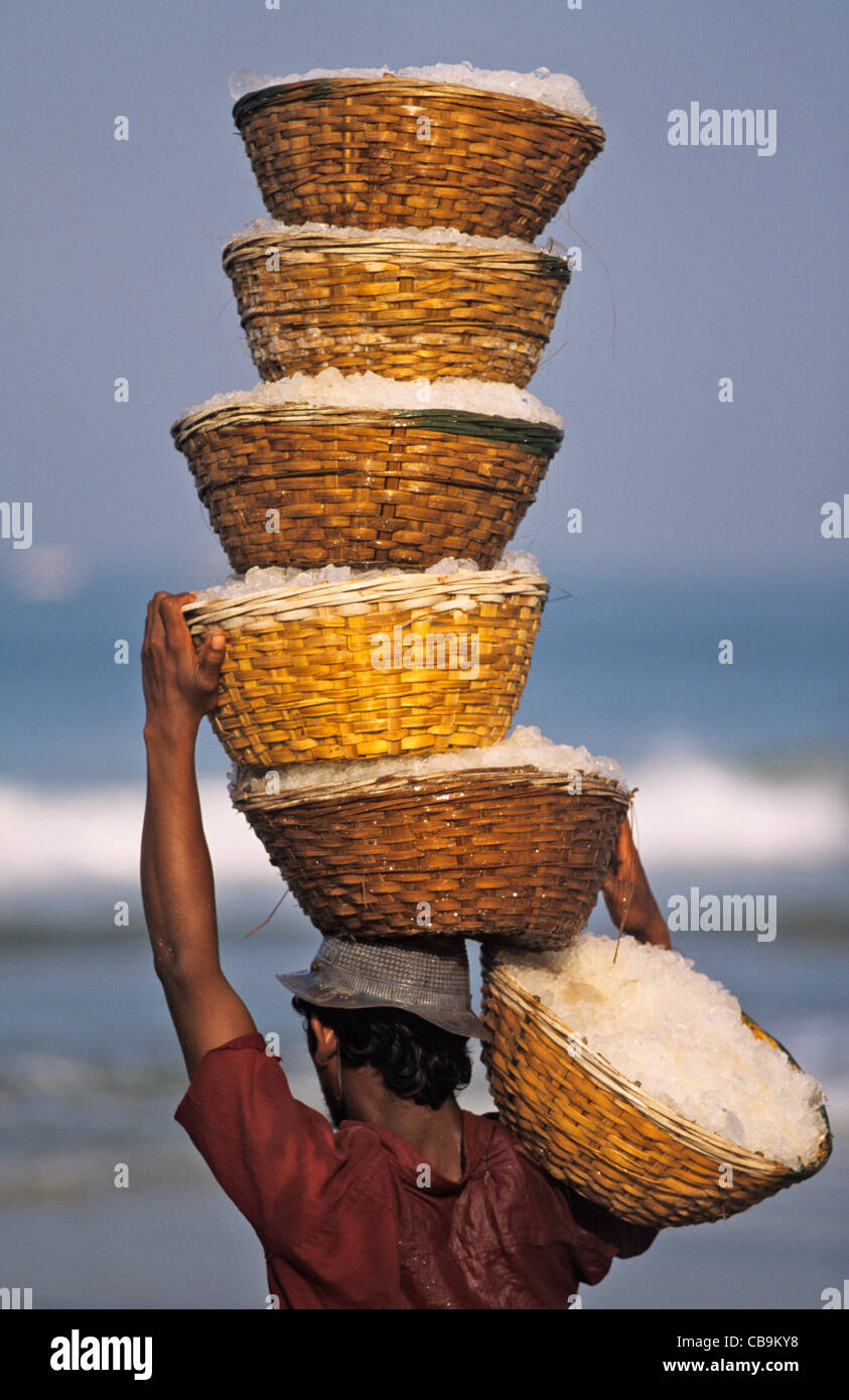 Fisherman and baskets Colva Beach Goa India Stock Photo - Alamy