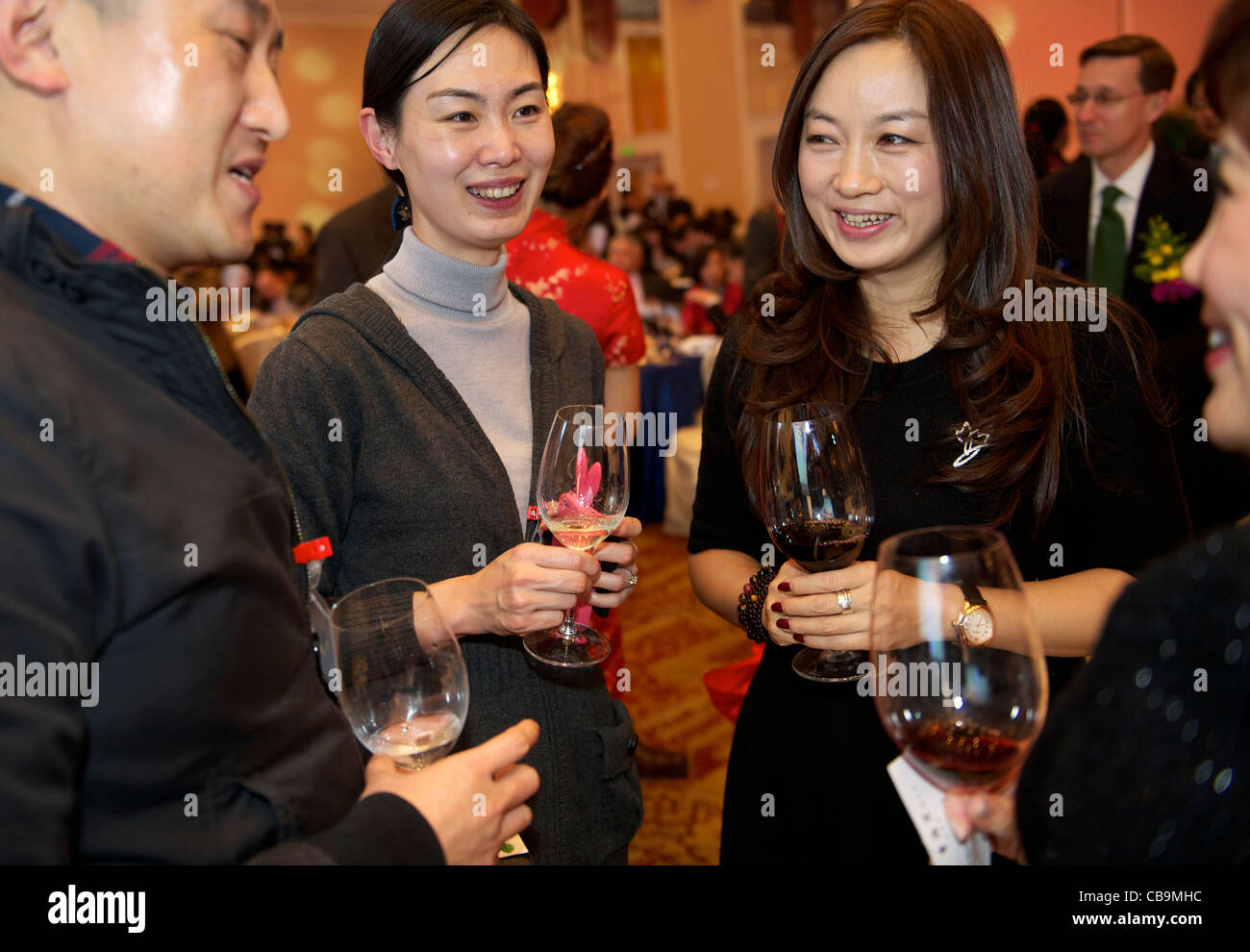 Chinese drink wine during a dinner party in Beijing, Chinas. 2011 Stock ...