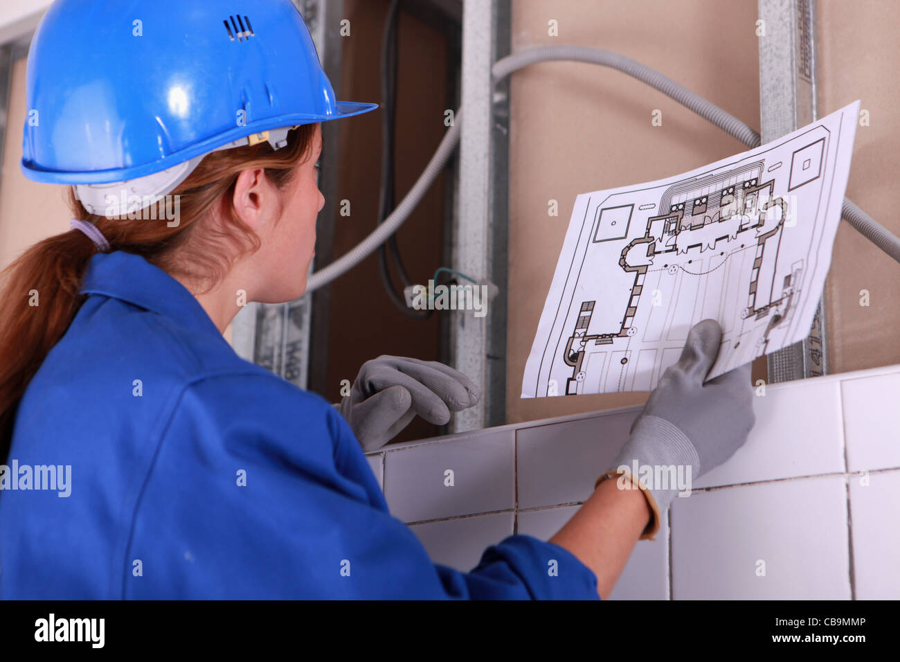 Woman looking installation drawing Stock Photo - Alamy