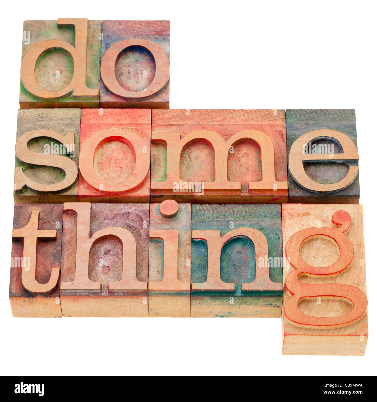 do something - a motivational phrase - isolated words in vintage wood ...