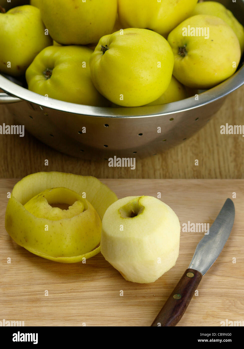 Peeling apples for cooking Stock Photo - Alamy
