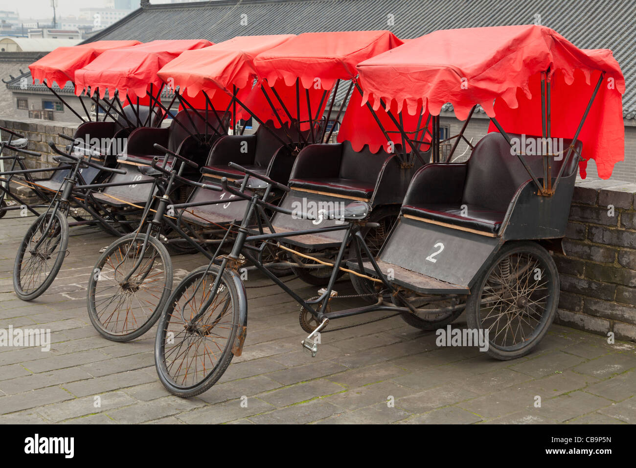 Bicycle rickshaws with Red canopy for hire Xian Shaanxi Province, PRC ...