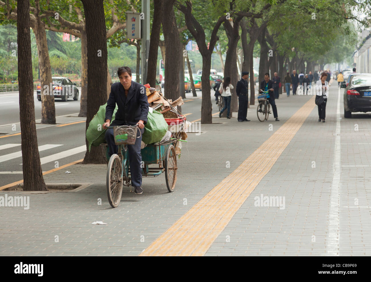 Chinese man bicycle hi-res stock photography and images - Alamy